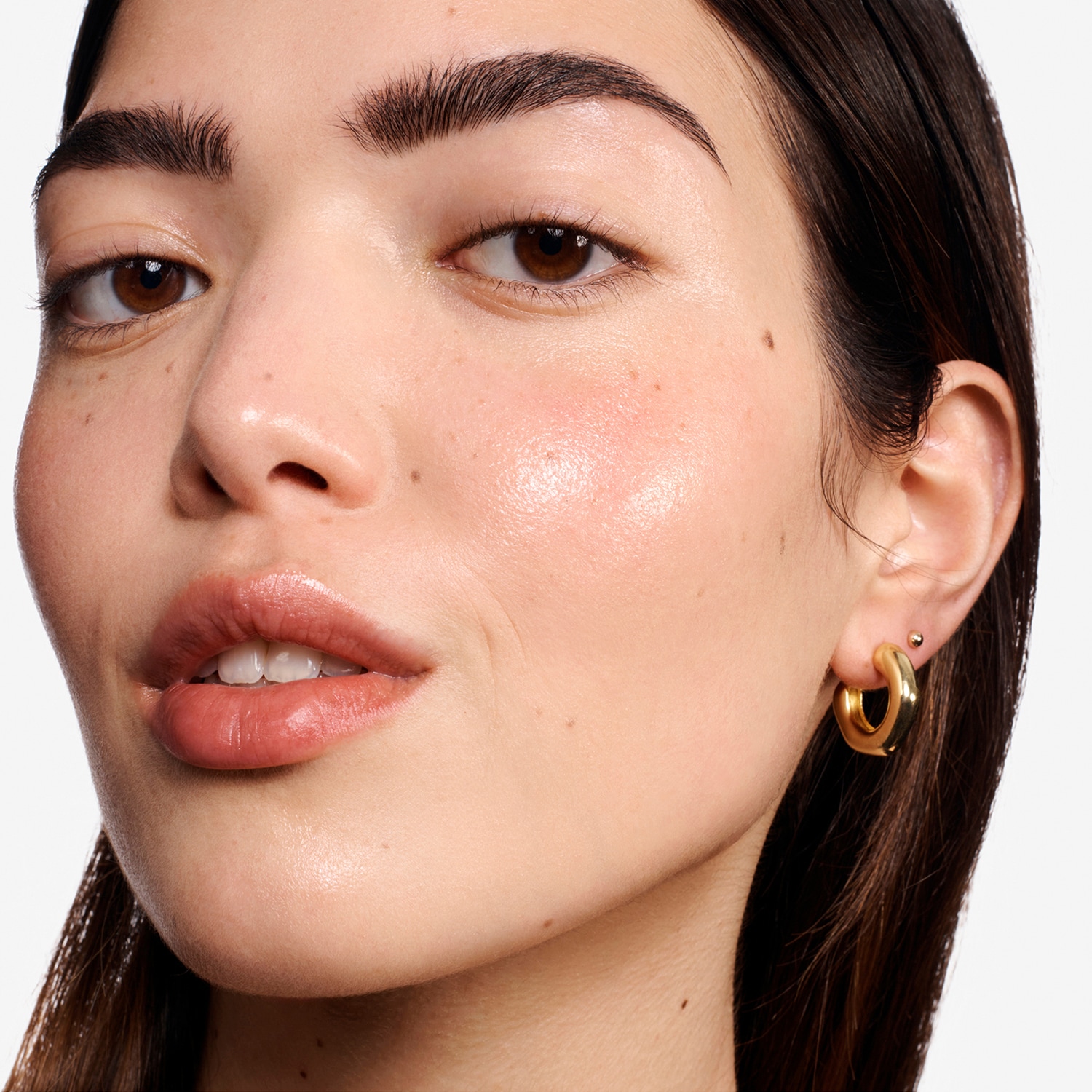 Futuredew Solid - Highlighter huile-sérum stick de GLOSSIER ≡ SEPHORA