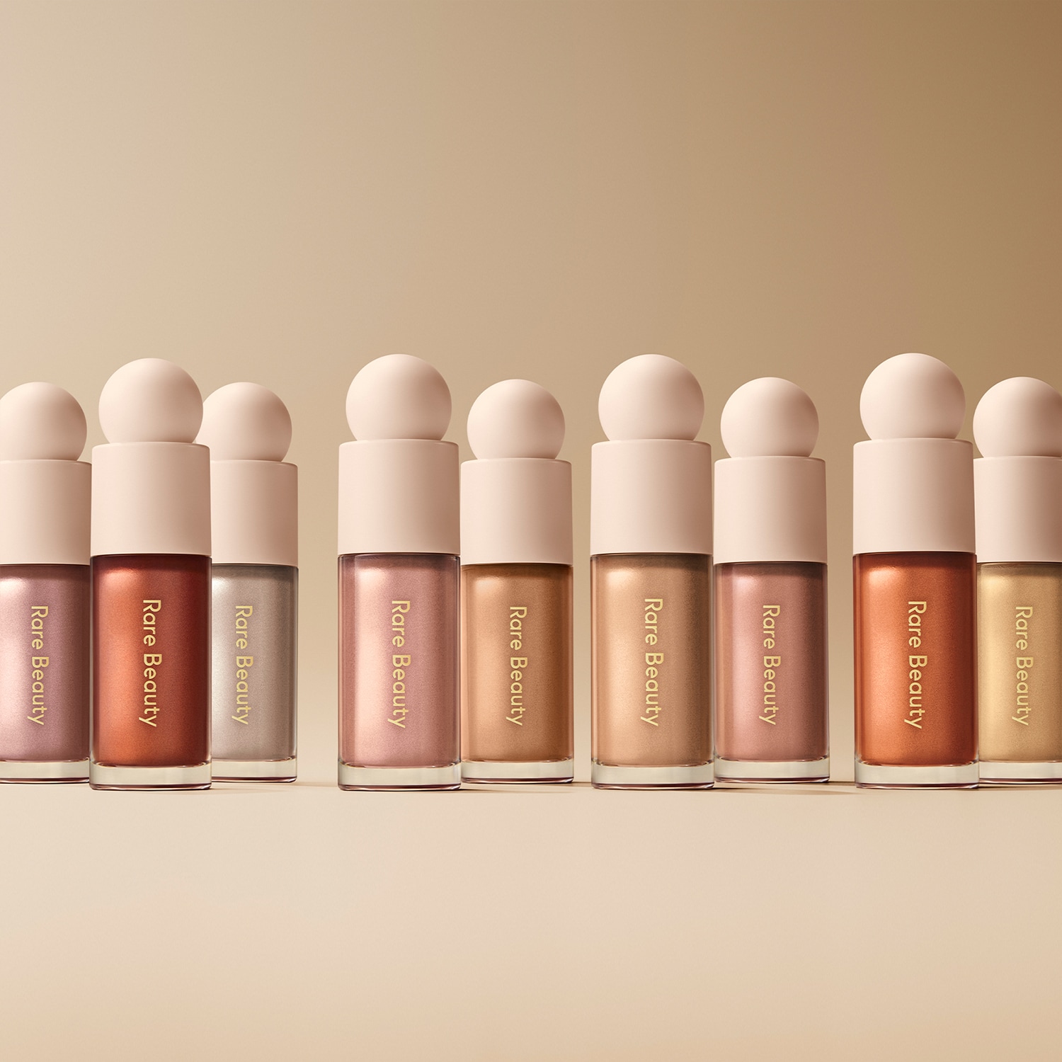 Positive Light Liquid Luminizer - Highlighter liquide de RARE BEAUTY ≡ SEPHORA